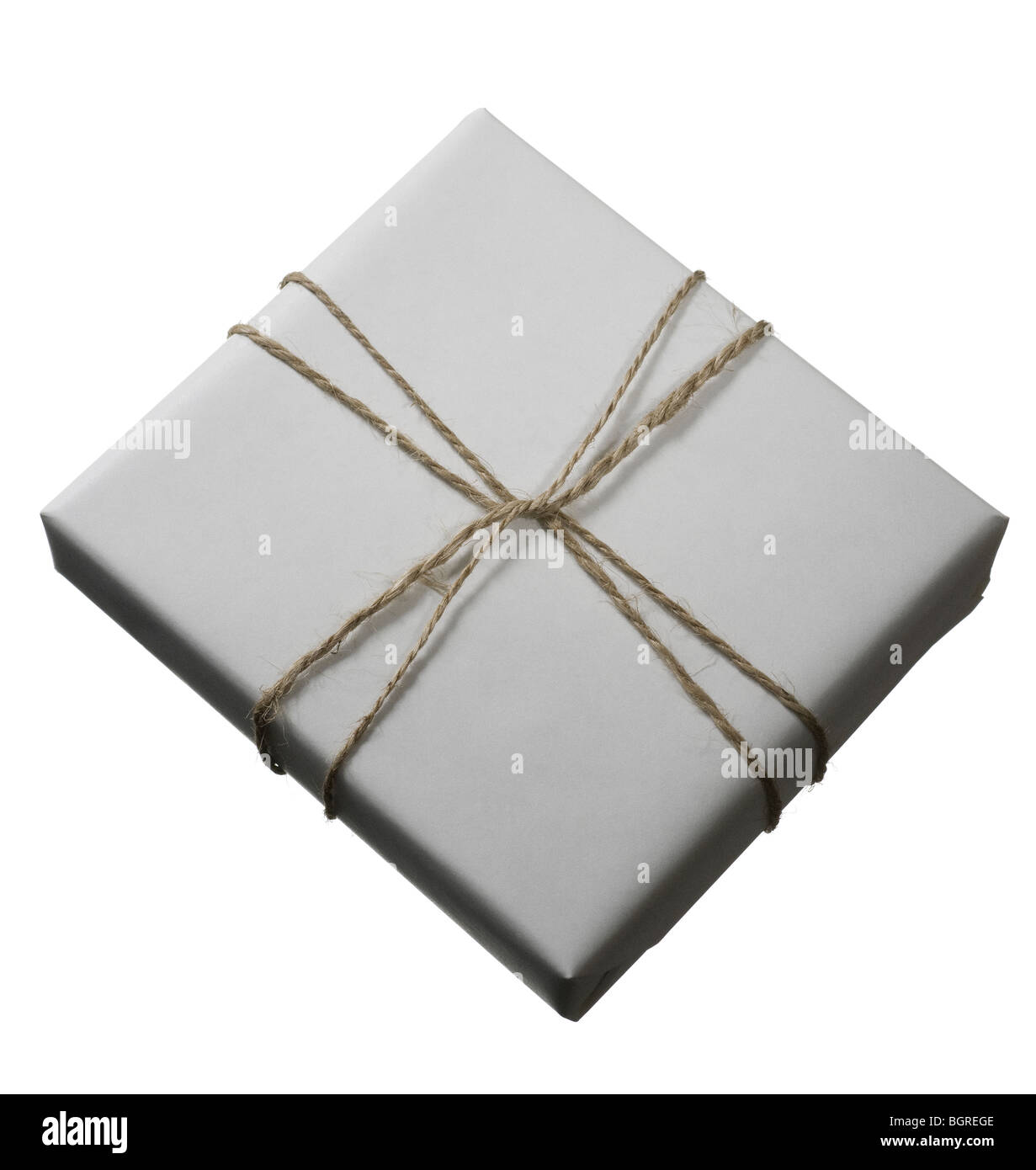 A wrapped gift against a white background Stock Photo - Alamy