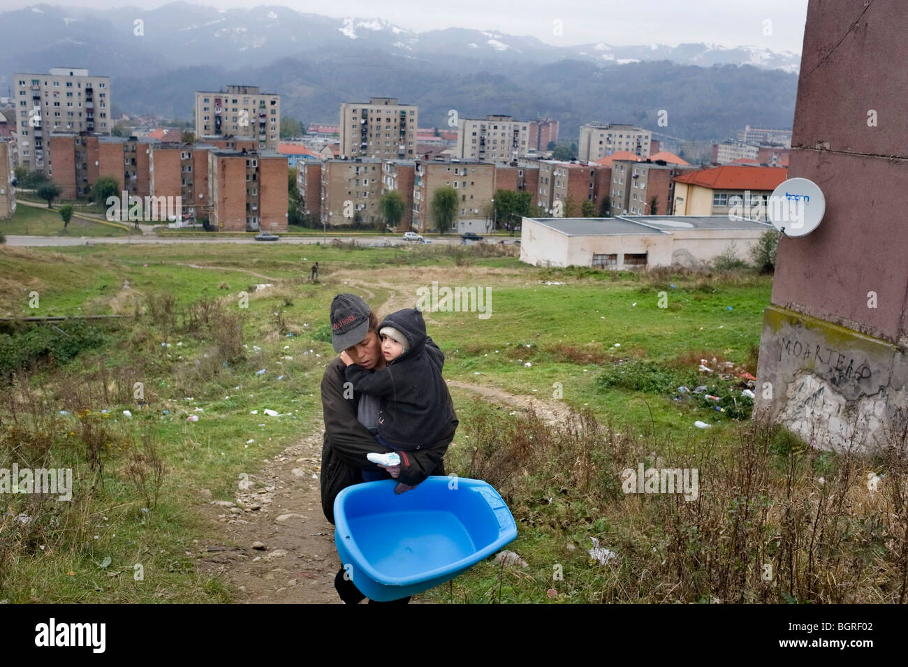 A woman with his kid in Vulcan city, a coal mining town Stock Photo - Alamy