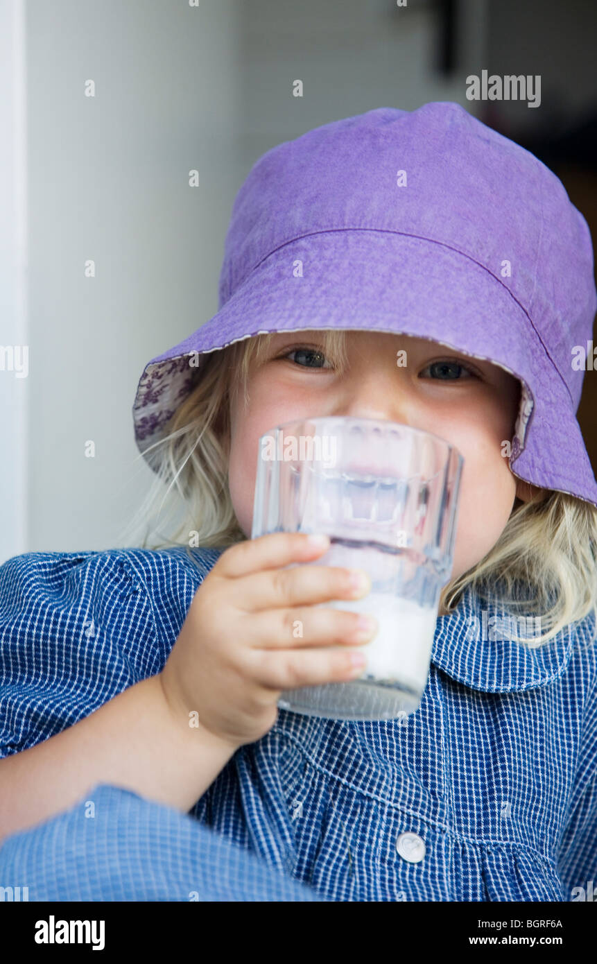 Girl drinking milk, Sweden Stock Photo - Alamy
