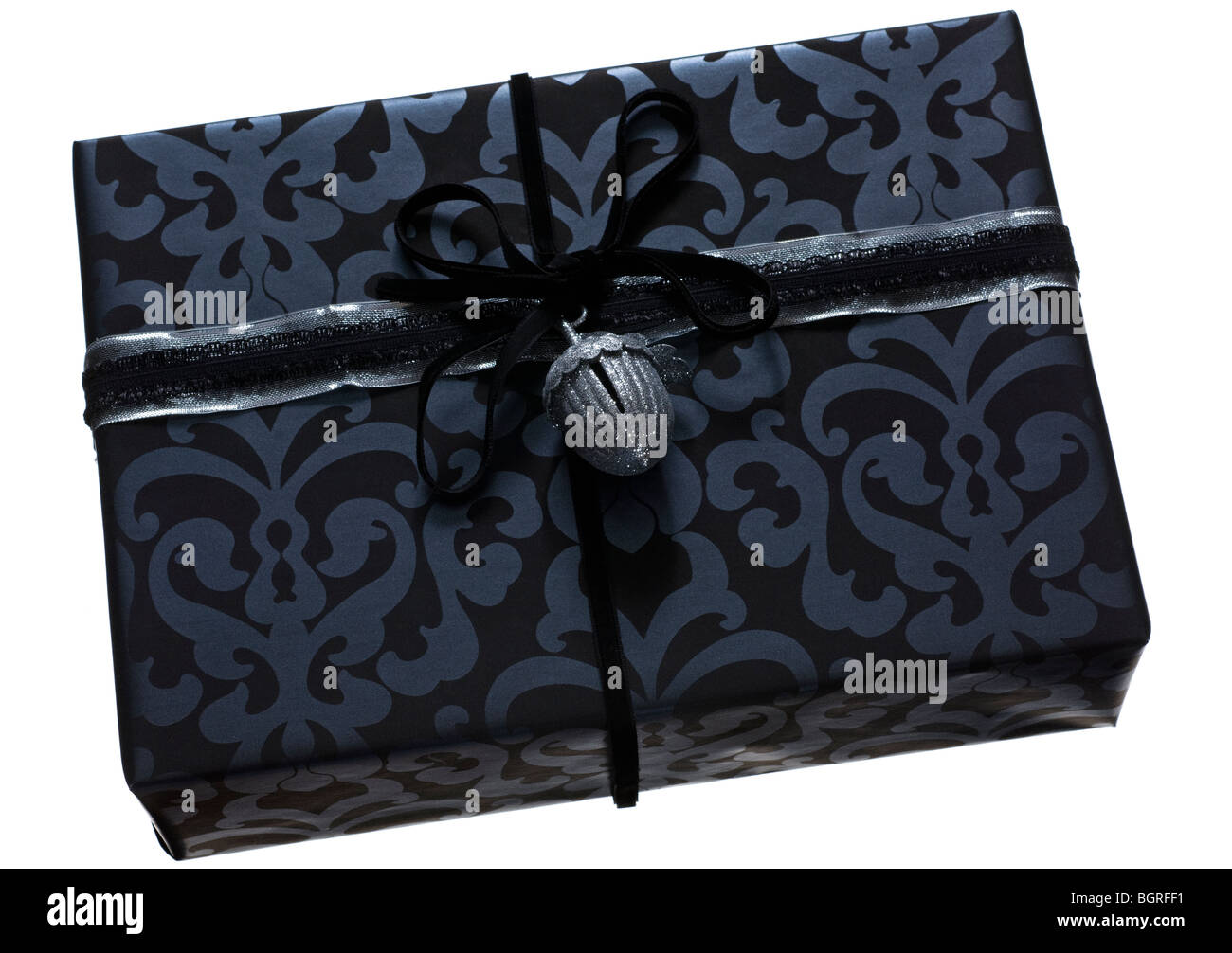 A wrapped gift against a white background Stock Photo - Alamy