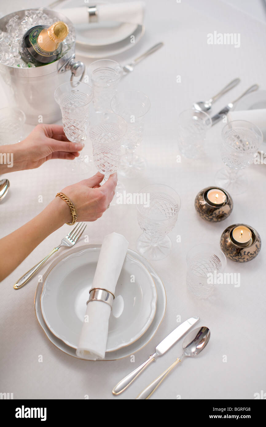 The laying of a table for a special occasion Stock Photo - Alamy