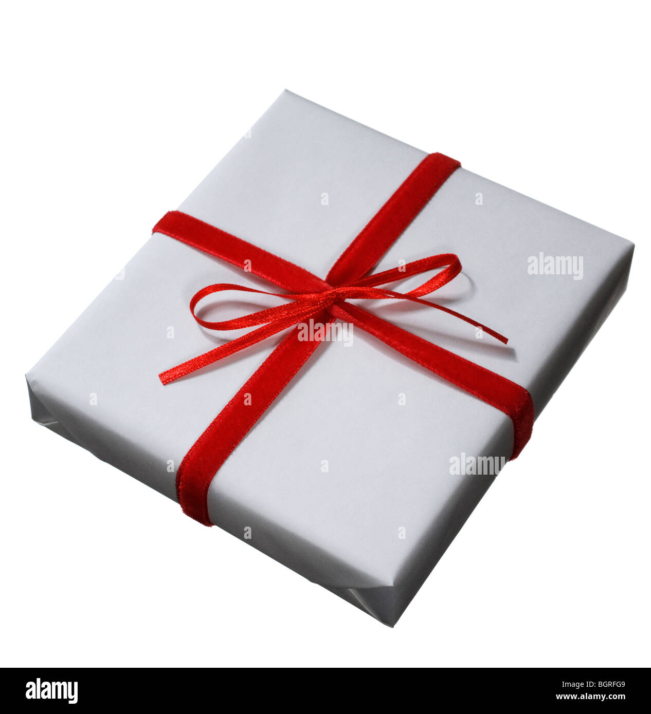 A wrapped gift against a white background Stock Photo - Alamy