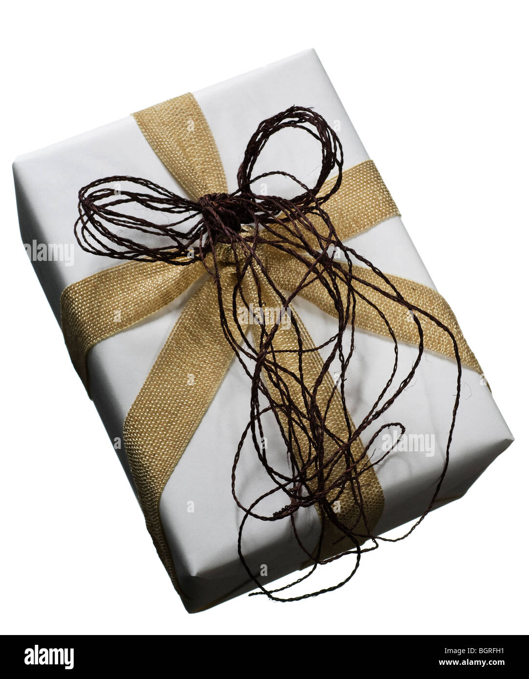 A wrapped gift against a white background Stock Photo - Alamy