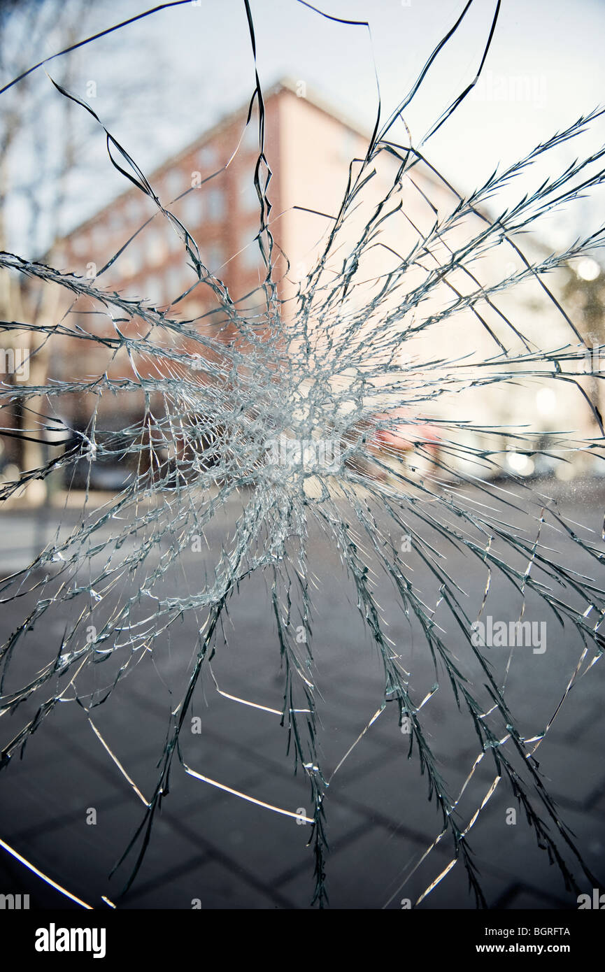 A smashed pane of glass, Sweden Stock Photo - Alamy