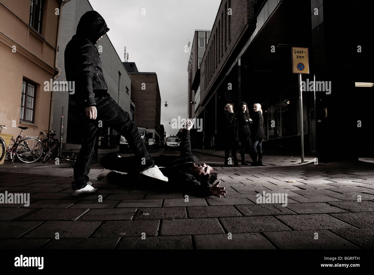 Young people fighting in the streets at night, Sweden Stock Photo - Alamy