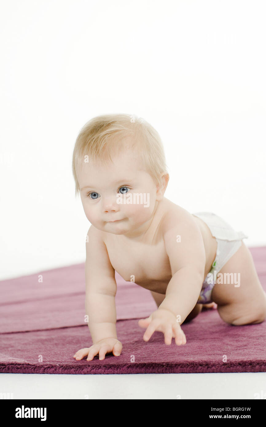 A baby crawling Stock Photo - Alamy