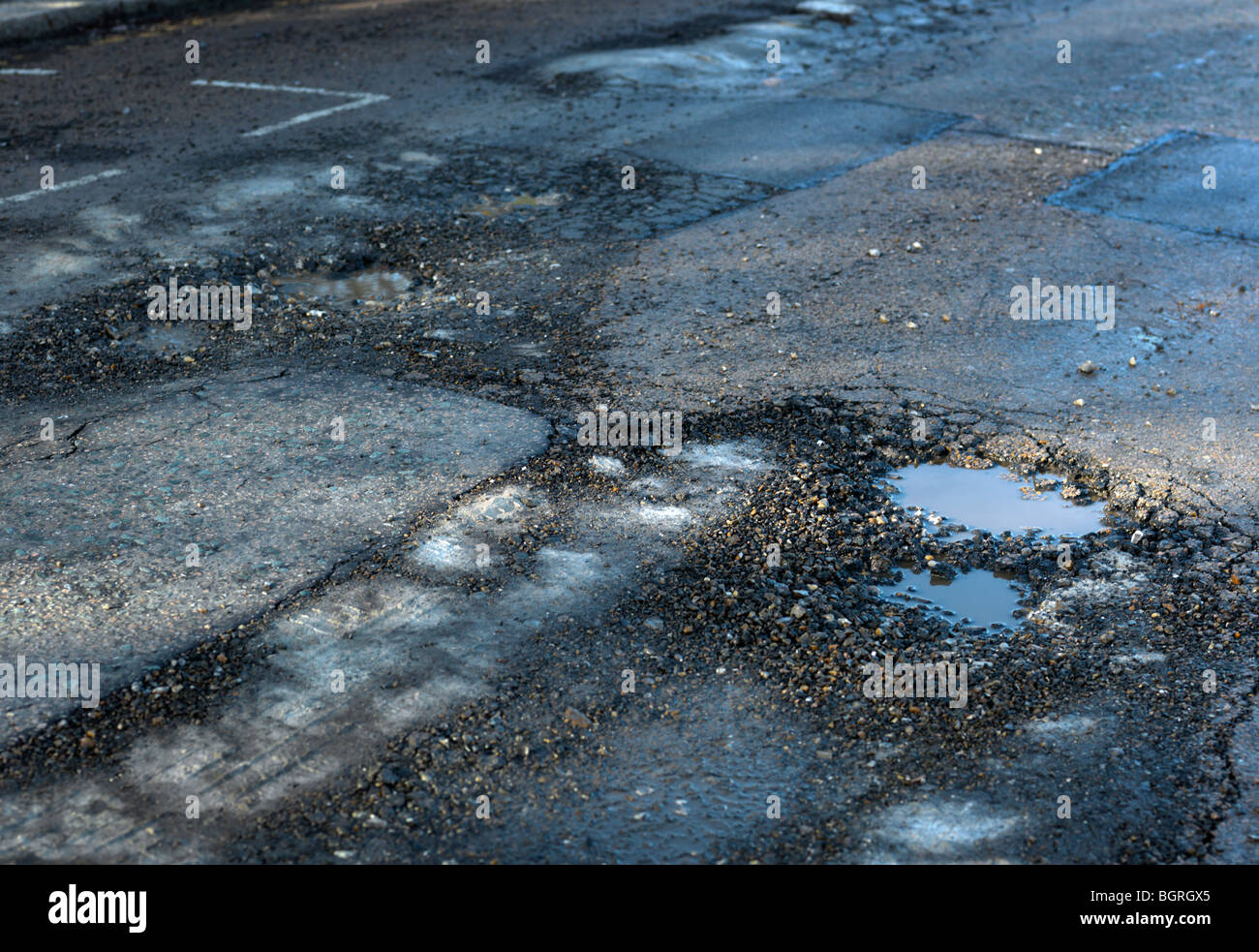 Filled holes in road hi-res stock photography and images - Alamy