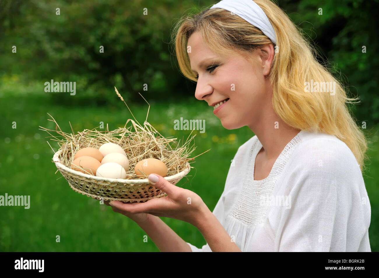 Young woman and Easter eggs Stock Photo - Alamy
