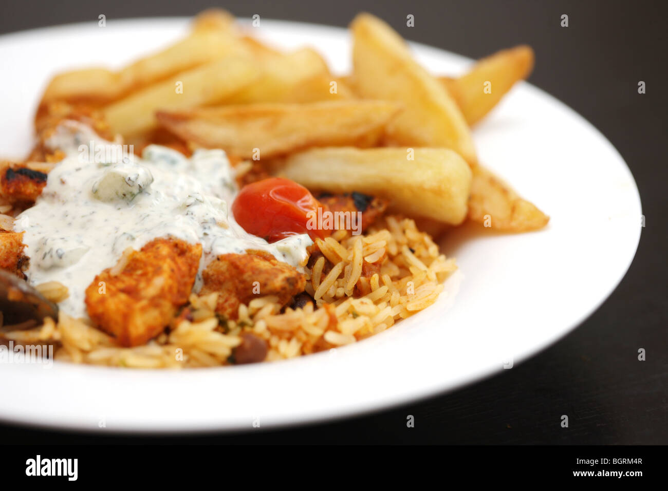 Freshly Prepared Indian Style Chicken Biryani Curry With Chips And ...