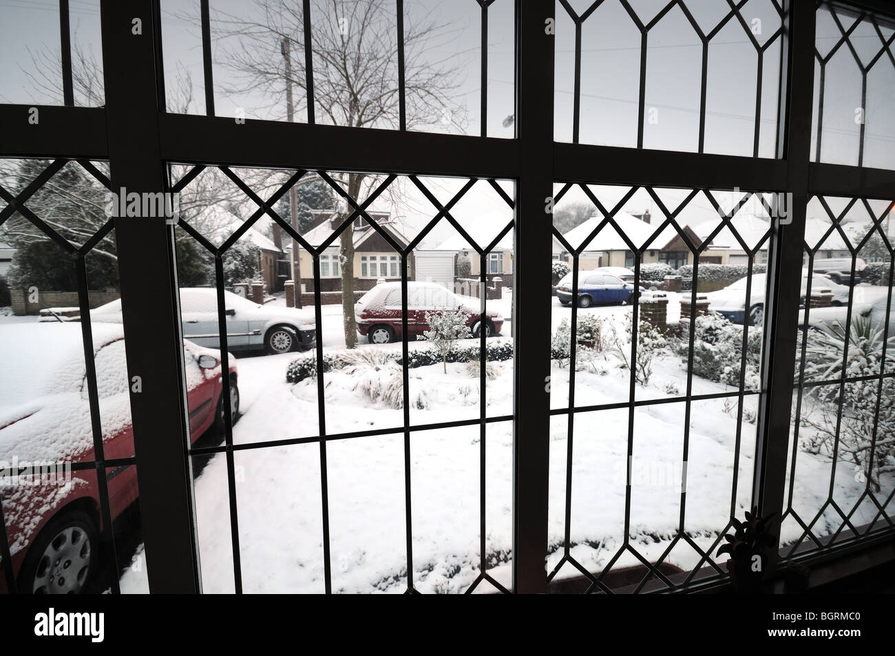Winter snow through house window Stock Photo - Alamy
