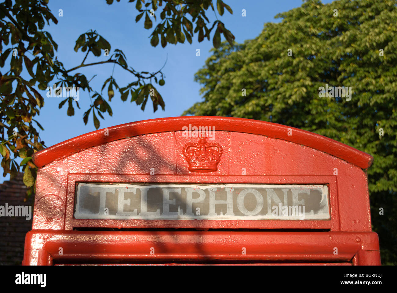 detail of a traditional british red telephone box showing crown Stock ...