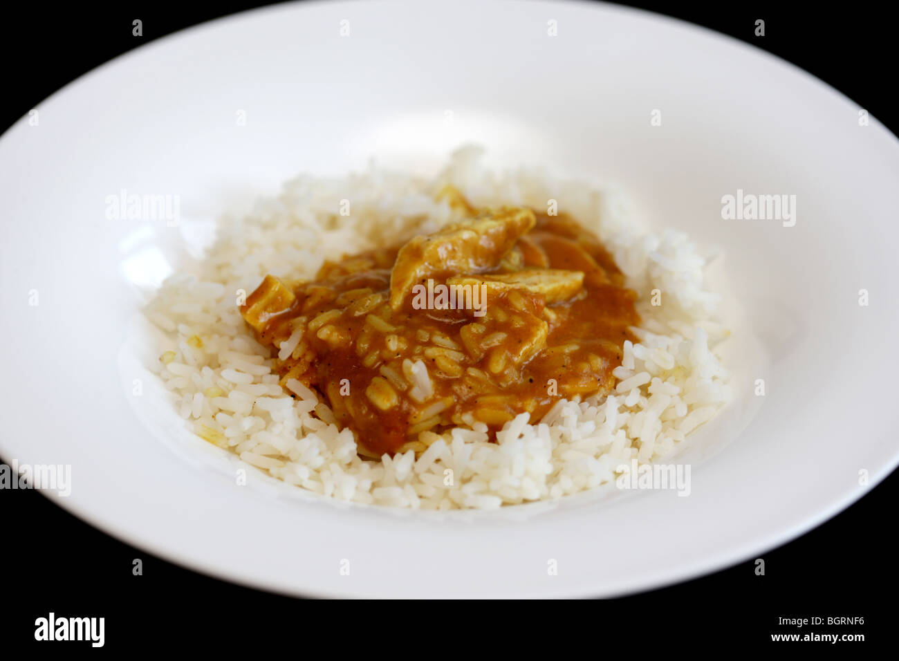 Chicken Curry with Long Grain Rice Stock Photo - Alamy