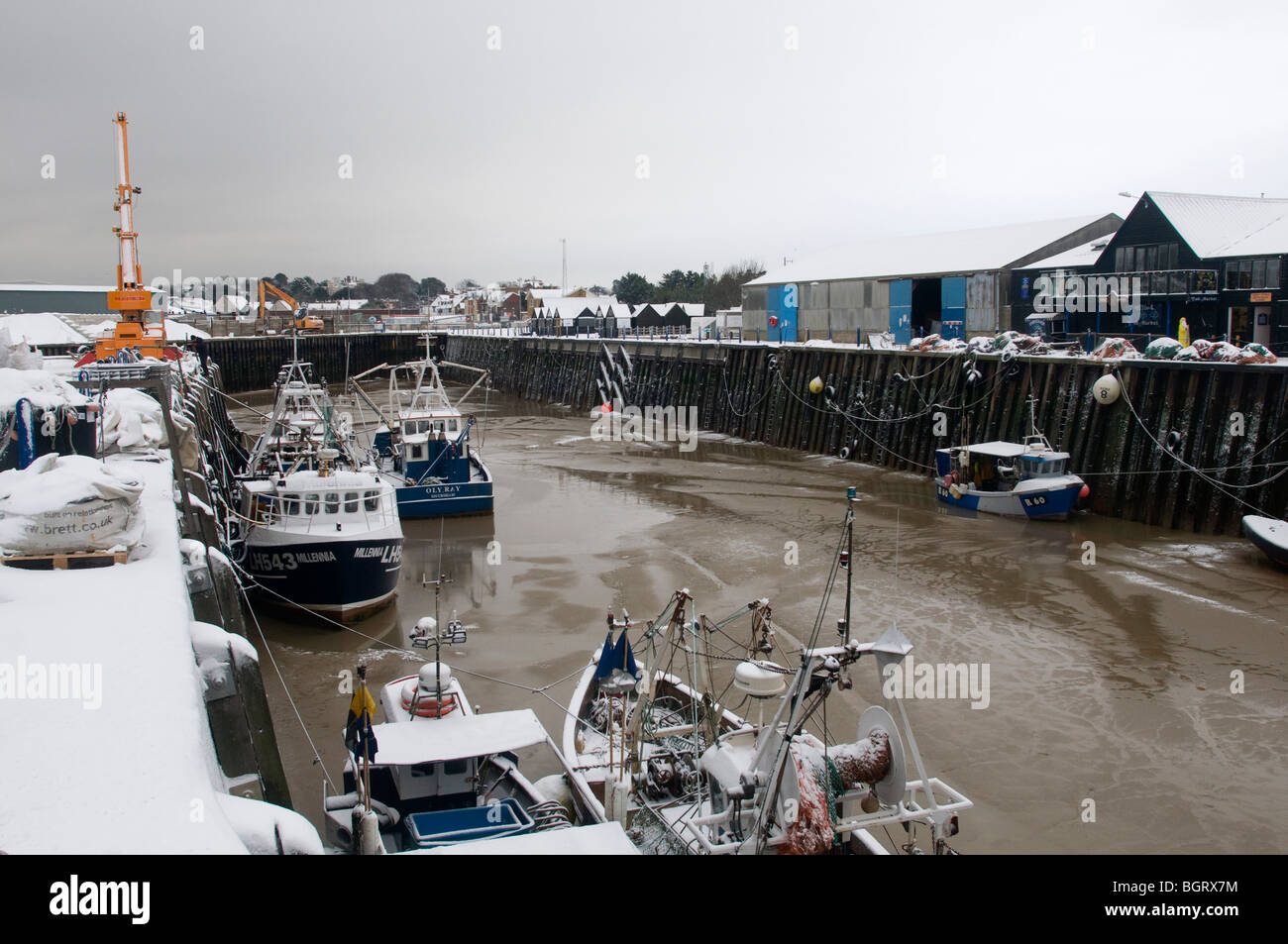 Whitstable Harbour in Snow whitstable kent countryside england UK Stock ...