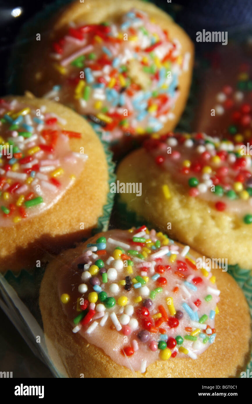 packet of colourful cup fairy cakes Stock Photo - Alamy