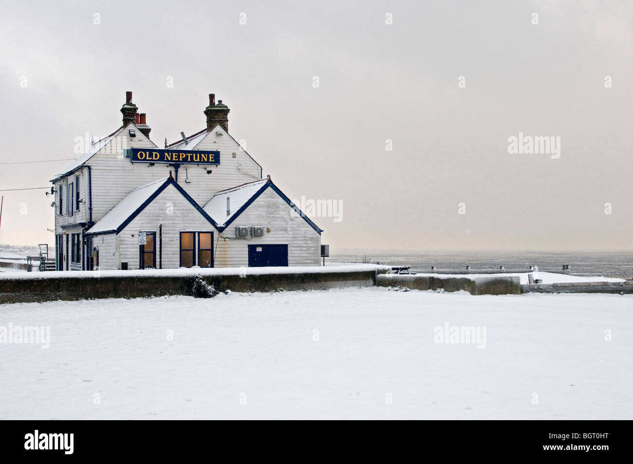 Snow on beach whitstable kent countryside england UK old neptune pub ...