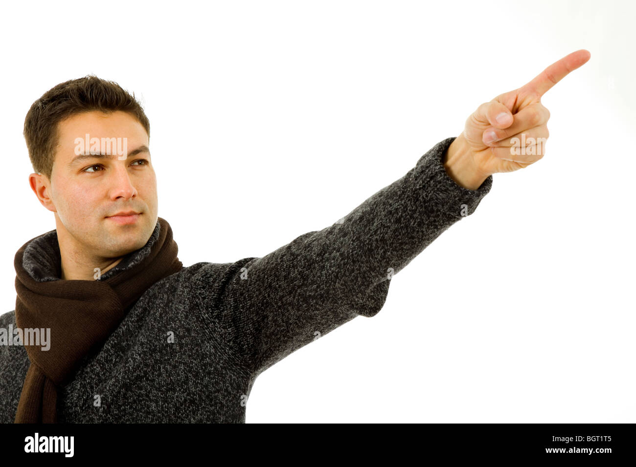 young man pointing with his finger, isolated Stock Photo - Alamy