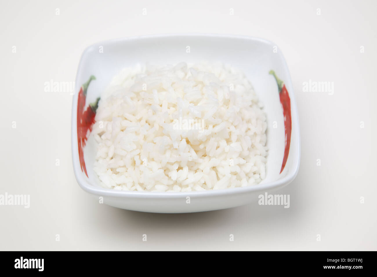 Bowl of white rice isolated on white Stock Photo - Alamy