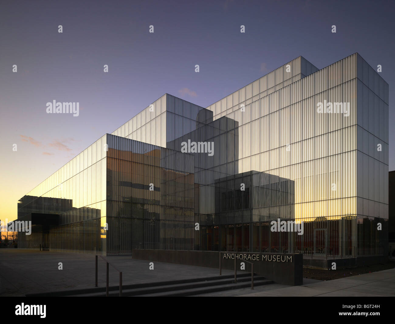anchorage museum linear volumes forming a highly reflective glass ...
