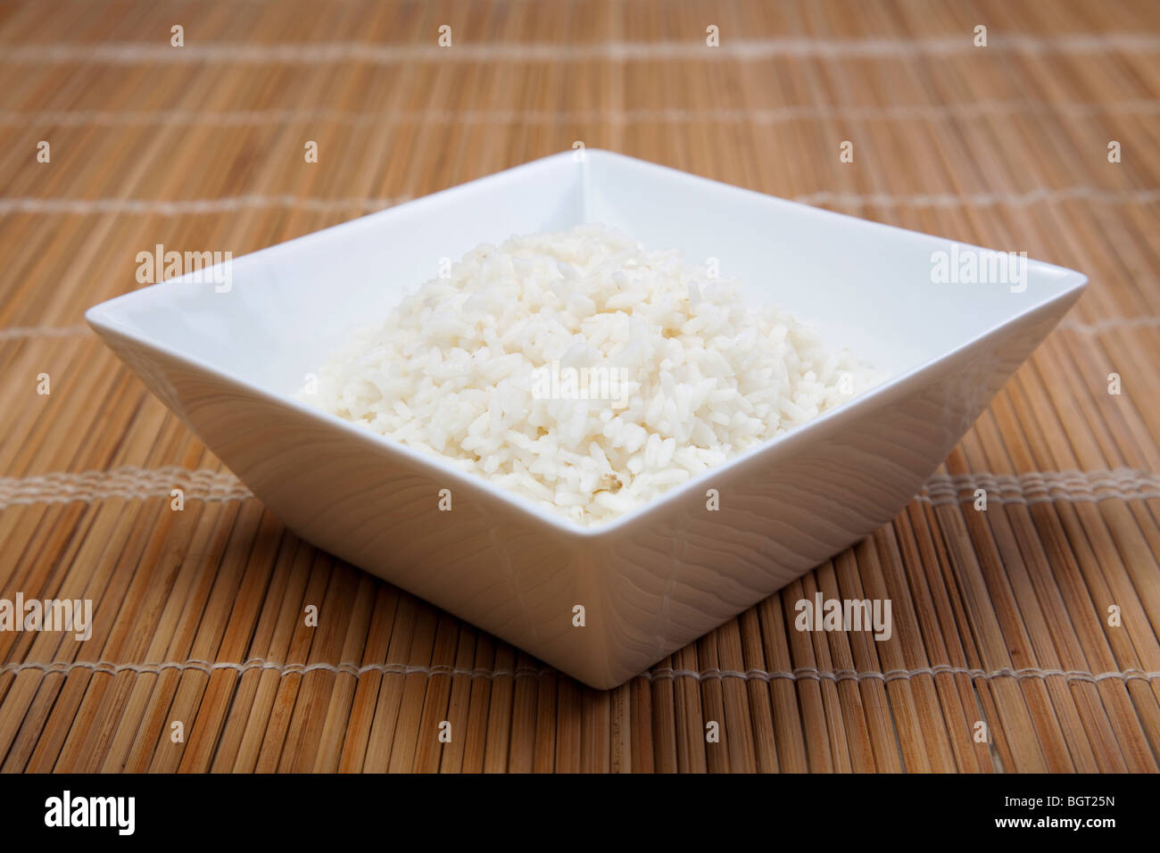 Bowl of white rice on tatami mat Stock Photo - Alamy