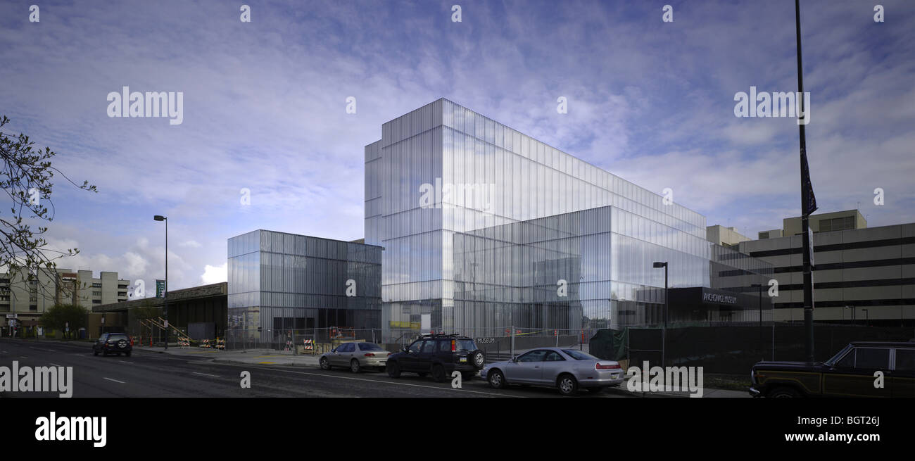 anchorage museum linear volumes forming a highly reflective glass ...