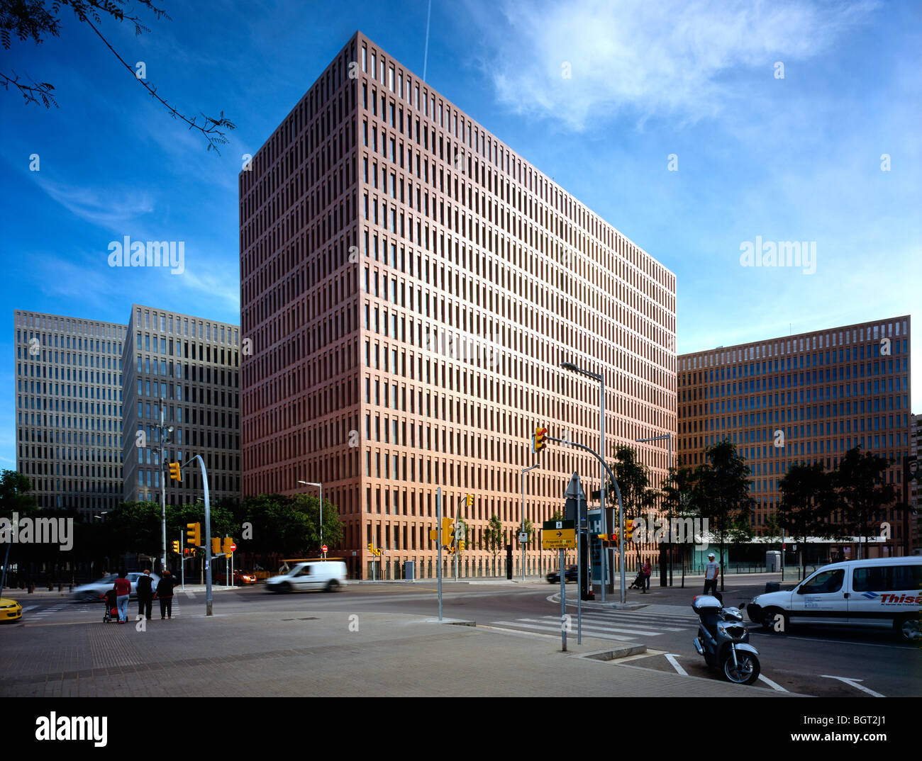 general exterior evening view of rear entrance and access to atrium as ...