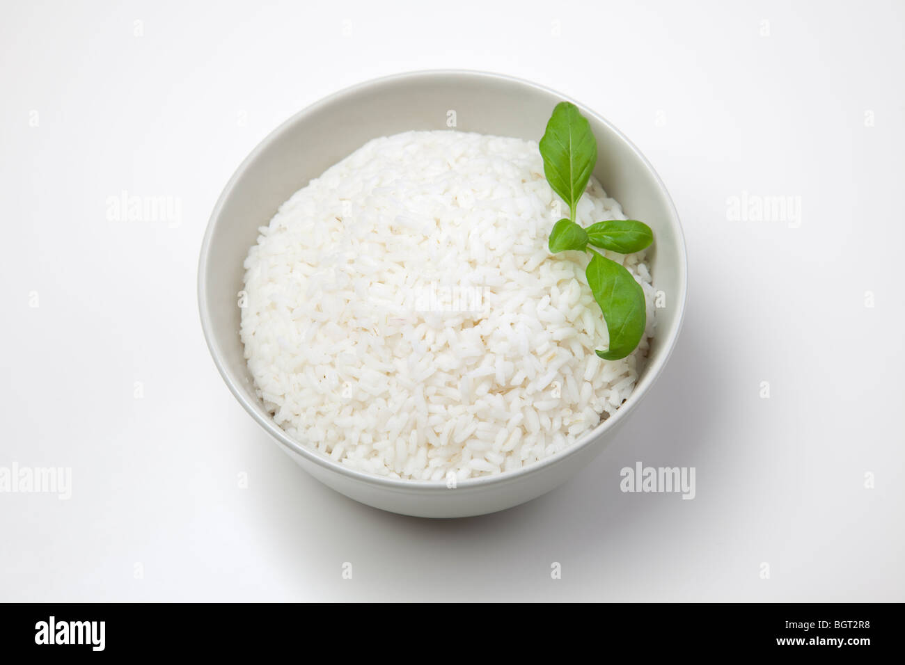 Bowl of white rice isolated on white Stock Photo - Alamy
