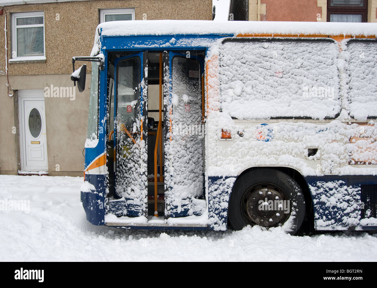 Bus stranded in the snow Stock Photo - Alamy