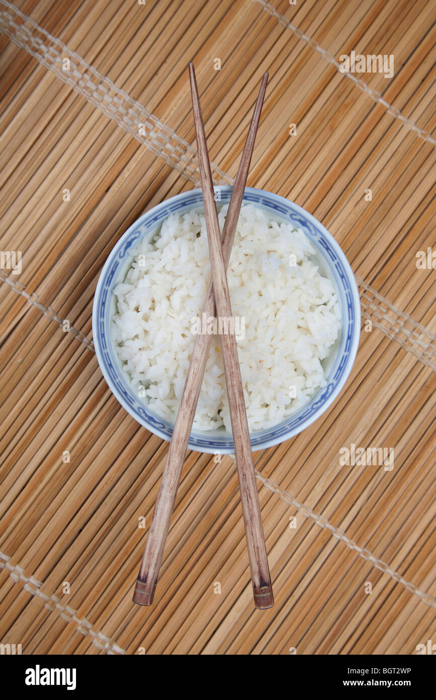 Bowl of white rice on tatami mat Stock Photo - Alamy
