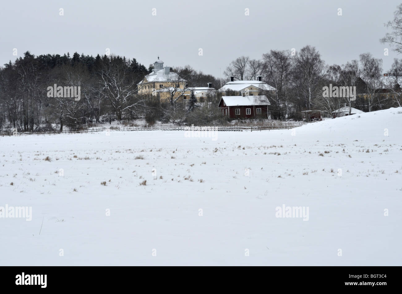 Farm in snowy landscape Stock Photo - Alamy