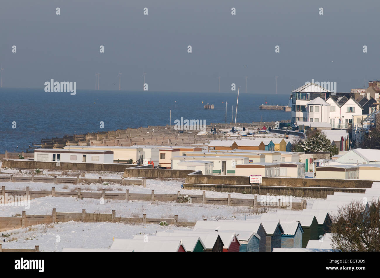 Whitstable beach huts at low tide in Snow whitstable kent countryside ...