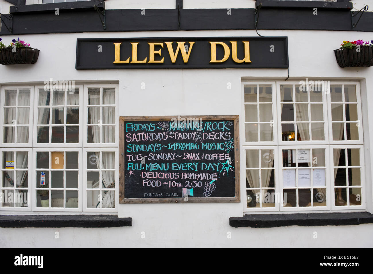 Exterior of Llew Du pub with chalkboard outside in Abergavenny ...