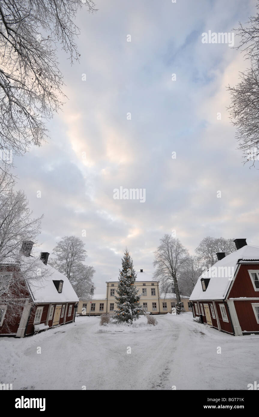 Farm in snowy landscape Stock Photo - Alamy