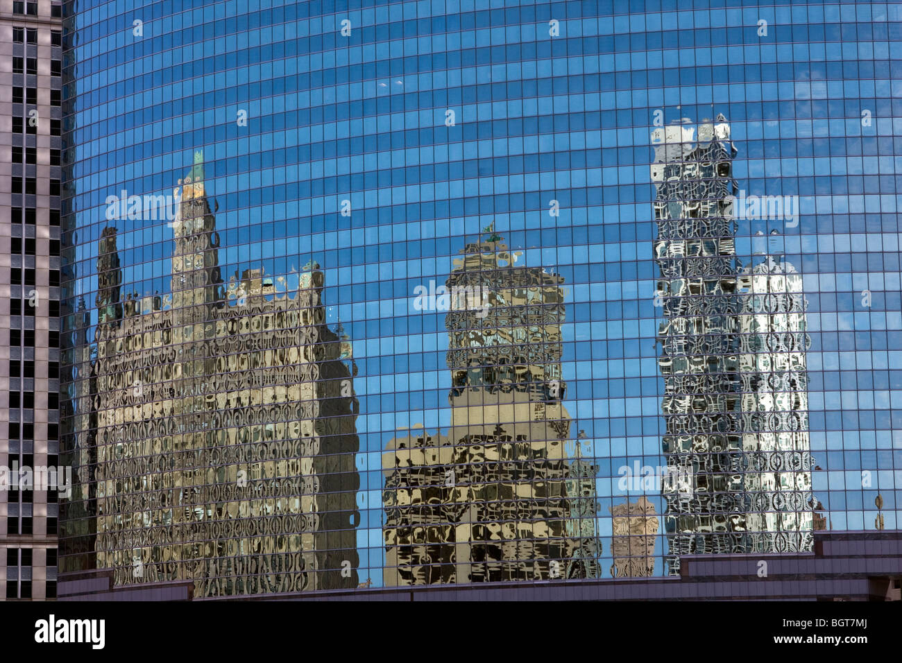 Architectural boat tour views of reflections in high rise windows ...