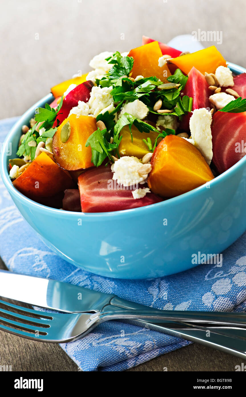 Bowl of roasted sliced red and golden beets Stock Photo - Alamy