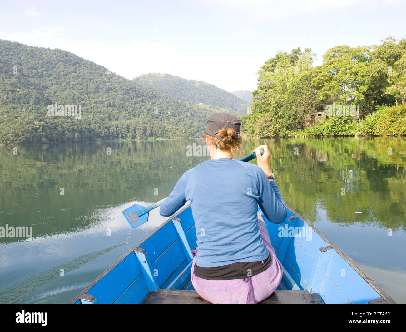 Woman on canoe hi-res stock photography and images - Alamy