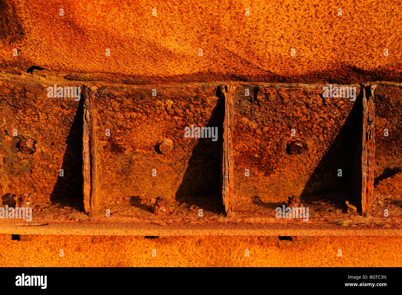Rust texture on disused machinery in a North Wales disused quarry Stock ...