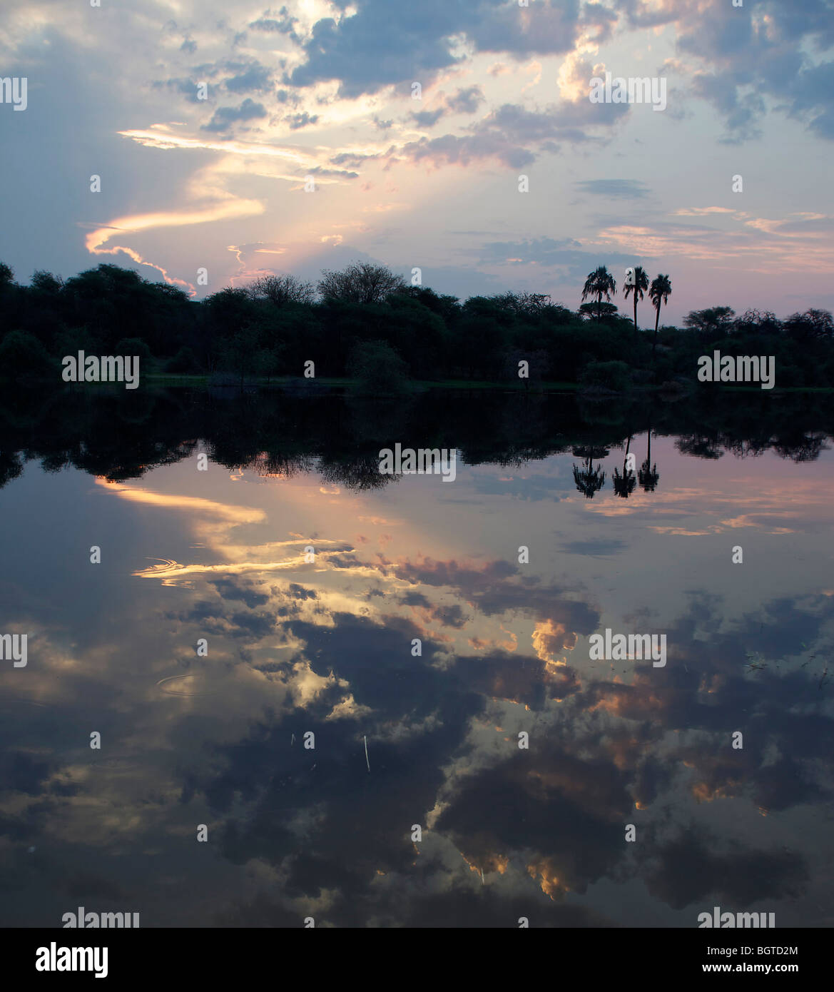 Sunset reflected in Boteti River, Botswana Stock Photo - Alamy