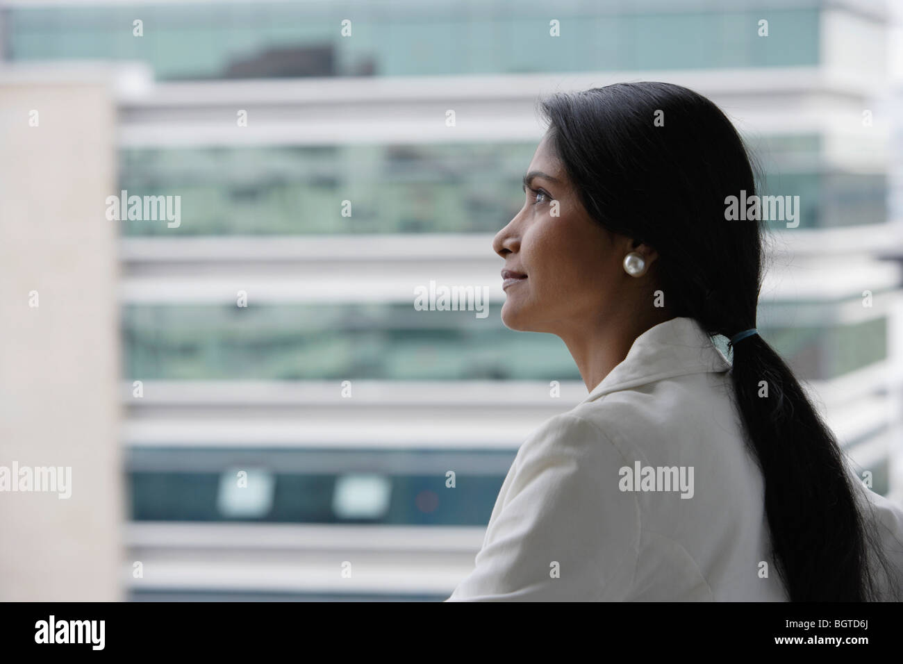 Profile of Indian woman looking at building Stock Photo - Alamy