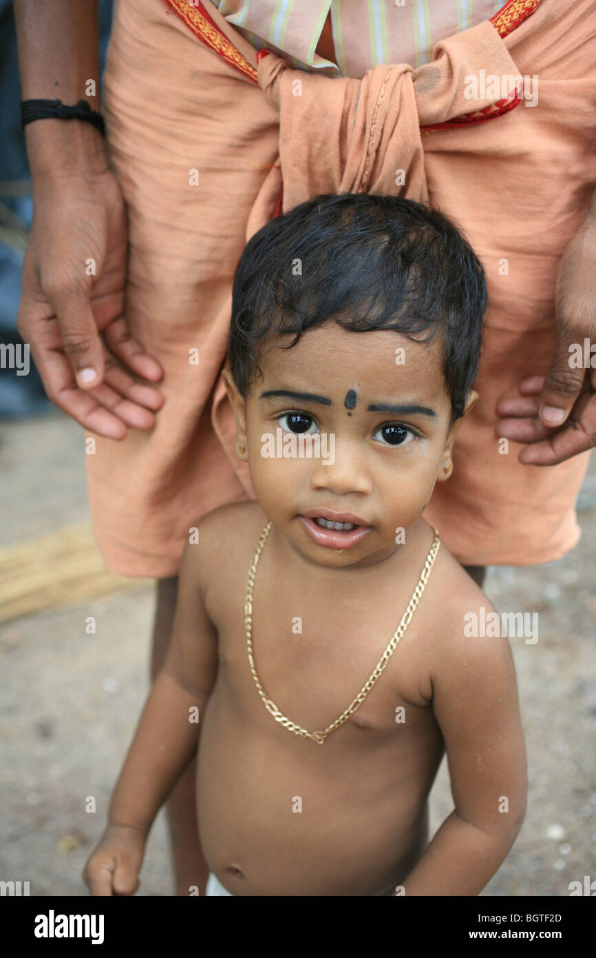 Local Child wearing a bindi smiling in a Coir Village in Alleppey ...