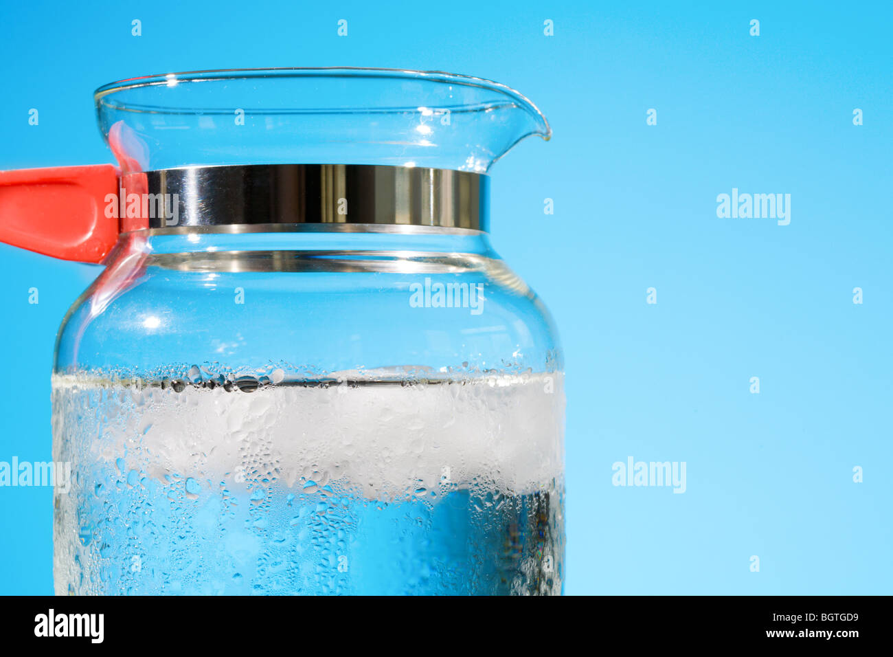 Pitcher with water and ice Stock Photo - Alamy