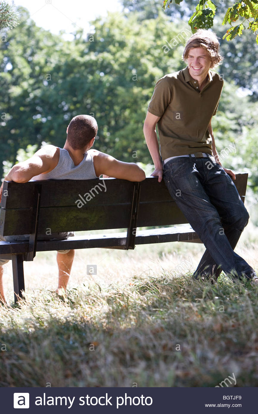 Two Men Man Sitting On A Bench Stock Photos & Two Men Man Sitting On A ...