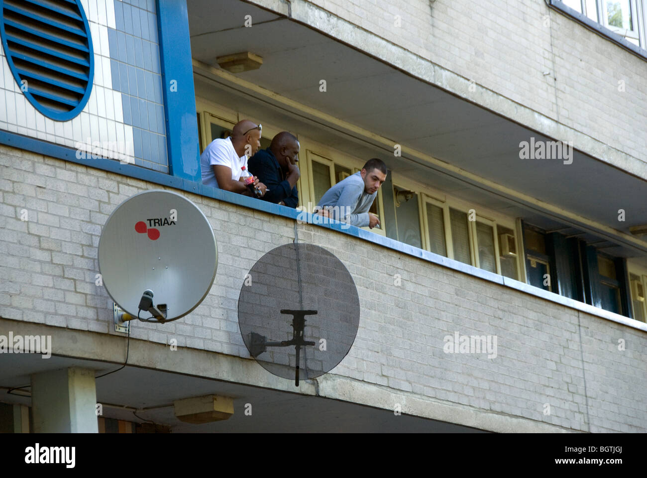 People on balcony Council estate in West London Stock Photo - Alamy