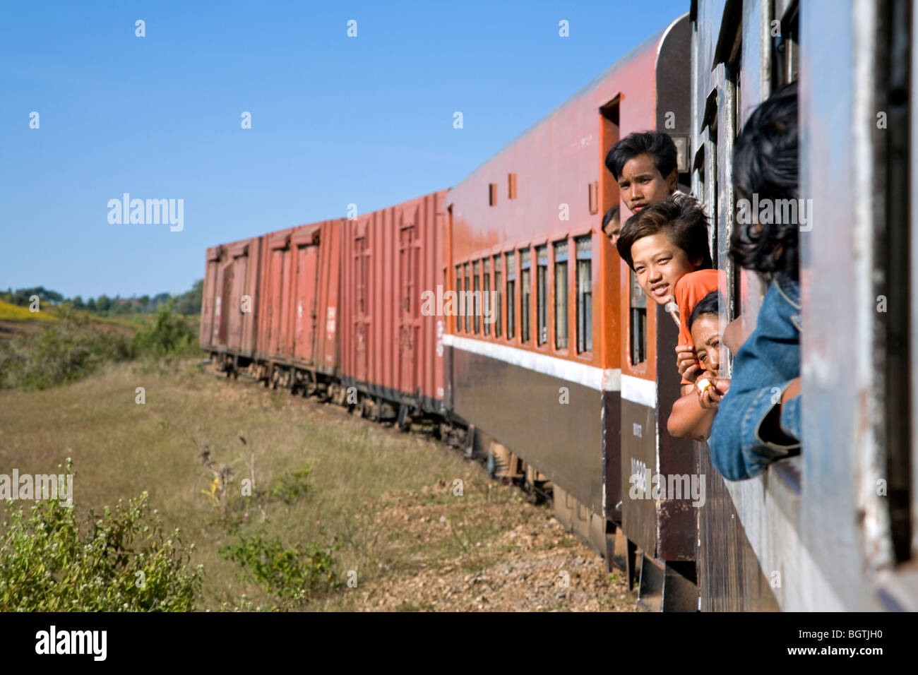 Passengers looking through the window train. Train Shwenyaung-Thazi ...