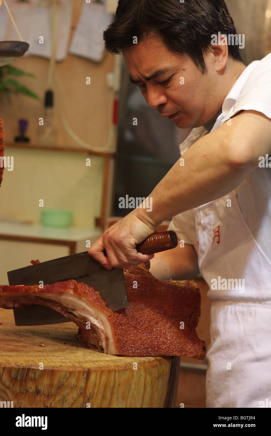 street butcher in hong kong Stock Photo - Alamy