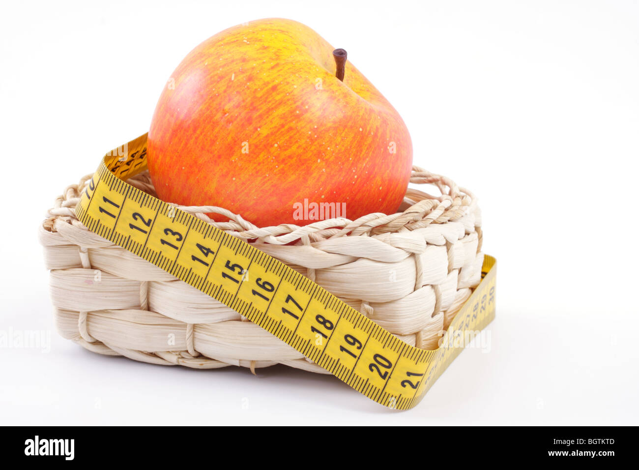 apple with a measuring tape, studio isolated. Apple artificial Stock ...