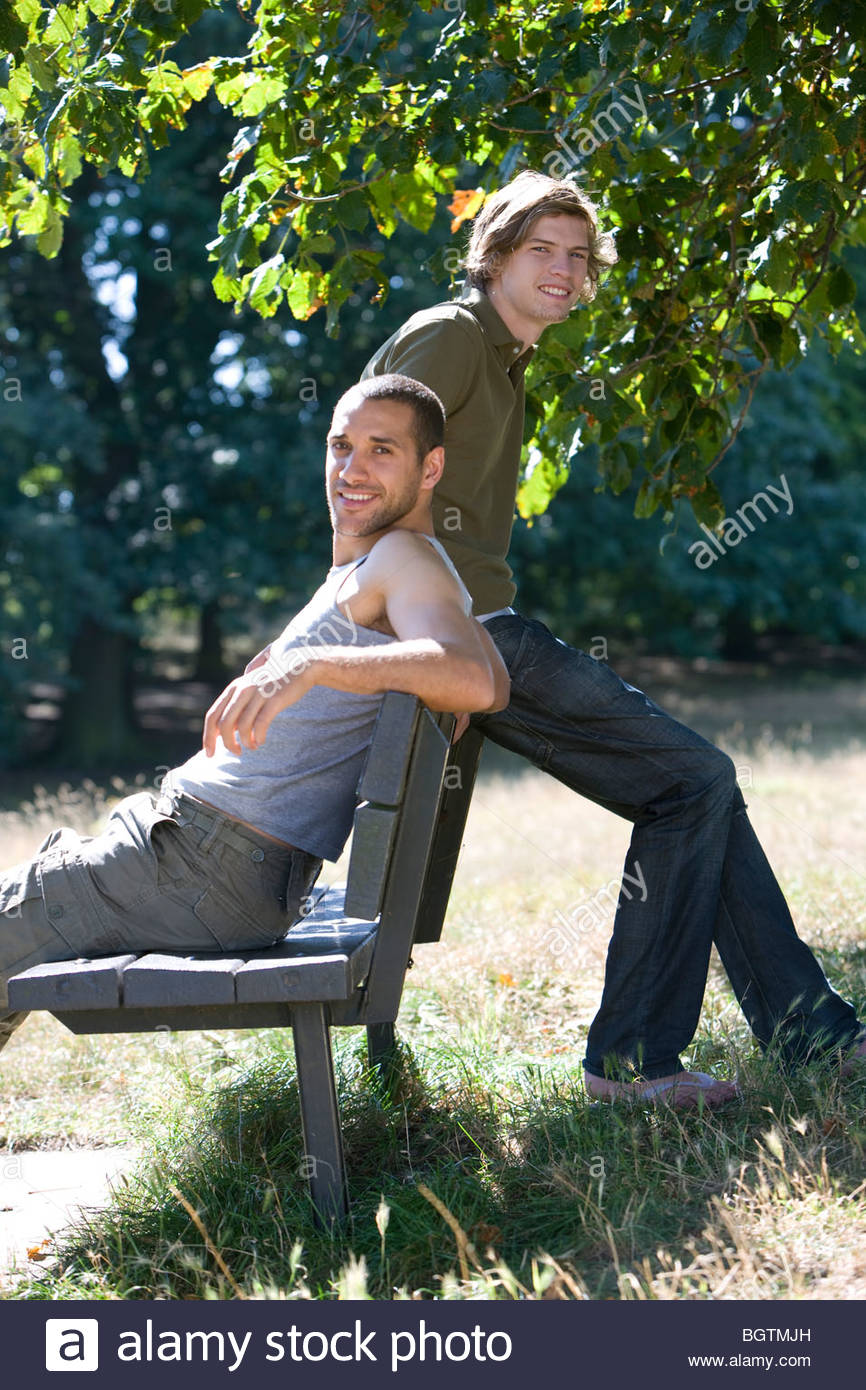 Two Men Man Sitting On A Bench Stock Photos & Two Men Man Sitting On A ...