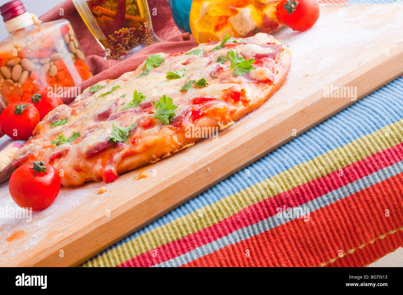 cheese and tomato pizza with rocket Stock Photo - Alamy