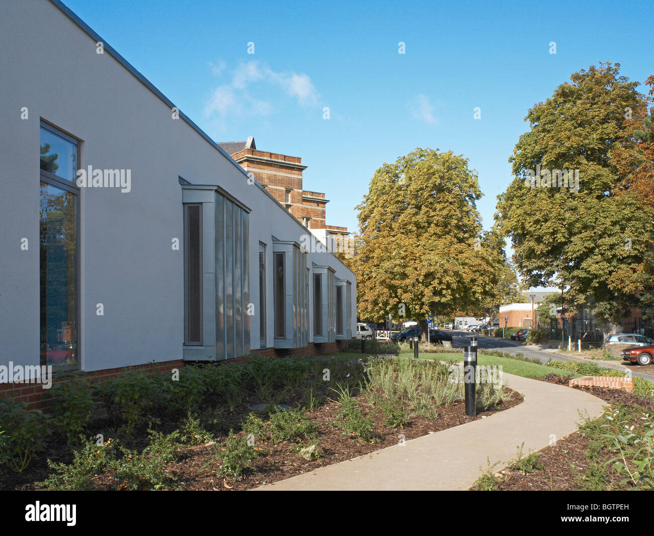 side of building showing landscaping and path Stock Photo - Alamy