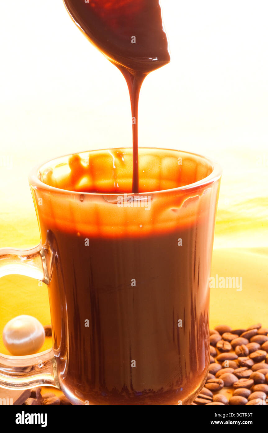 tasty liquid chocolate on glass Stock Photo - Alamy