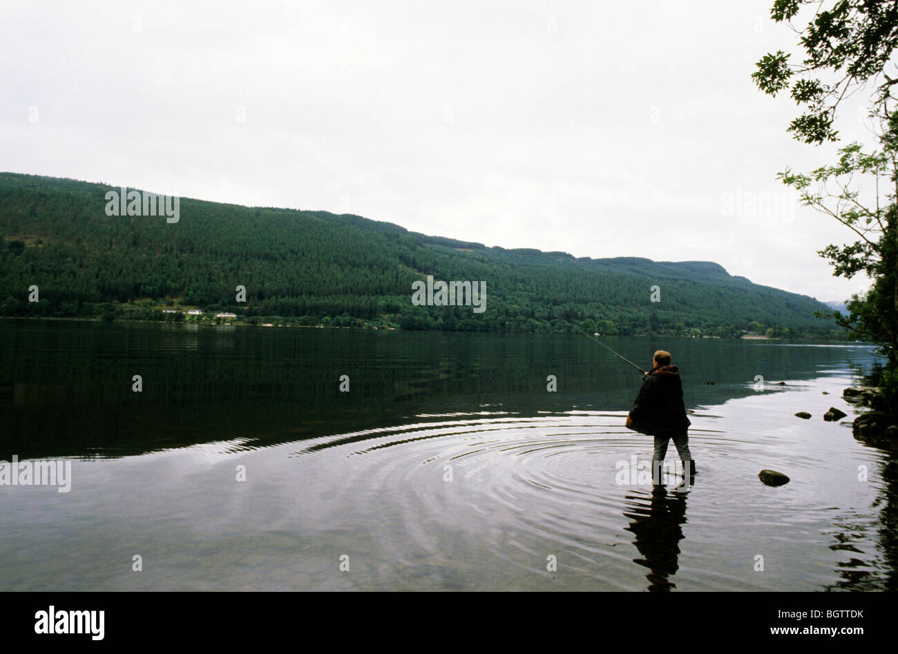 Man river fishing Stock Photo - Alamy